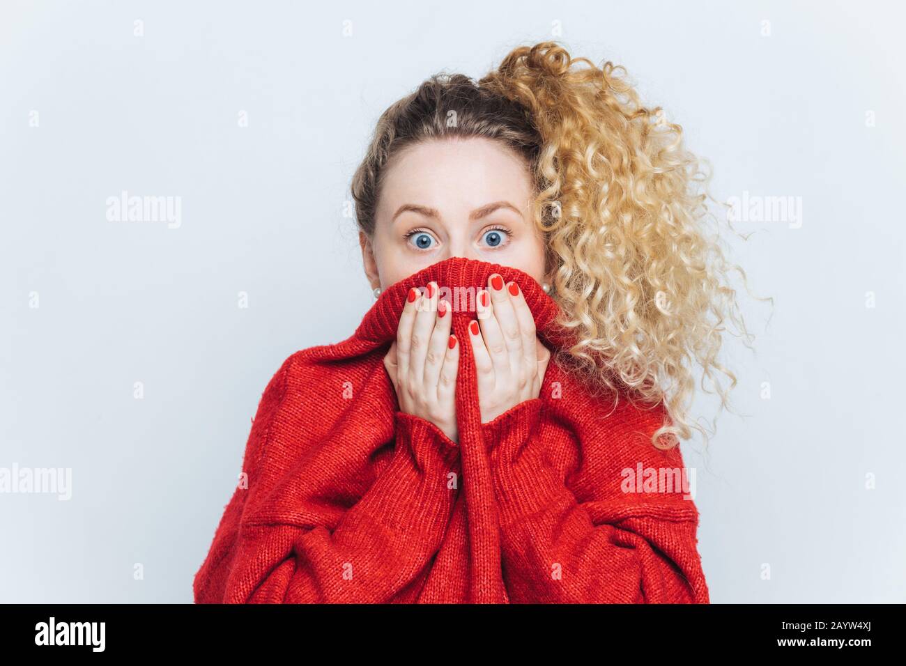Shocked scared beautiful female stares at camera, being afraid of ...