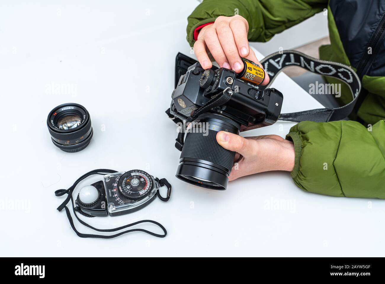 loading a film on old vintage SLR camera Stock Photo - Alamy