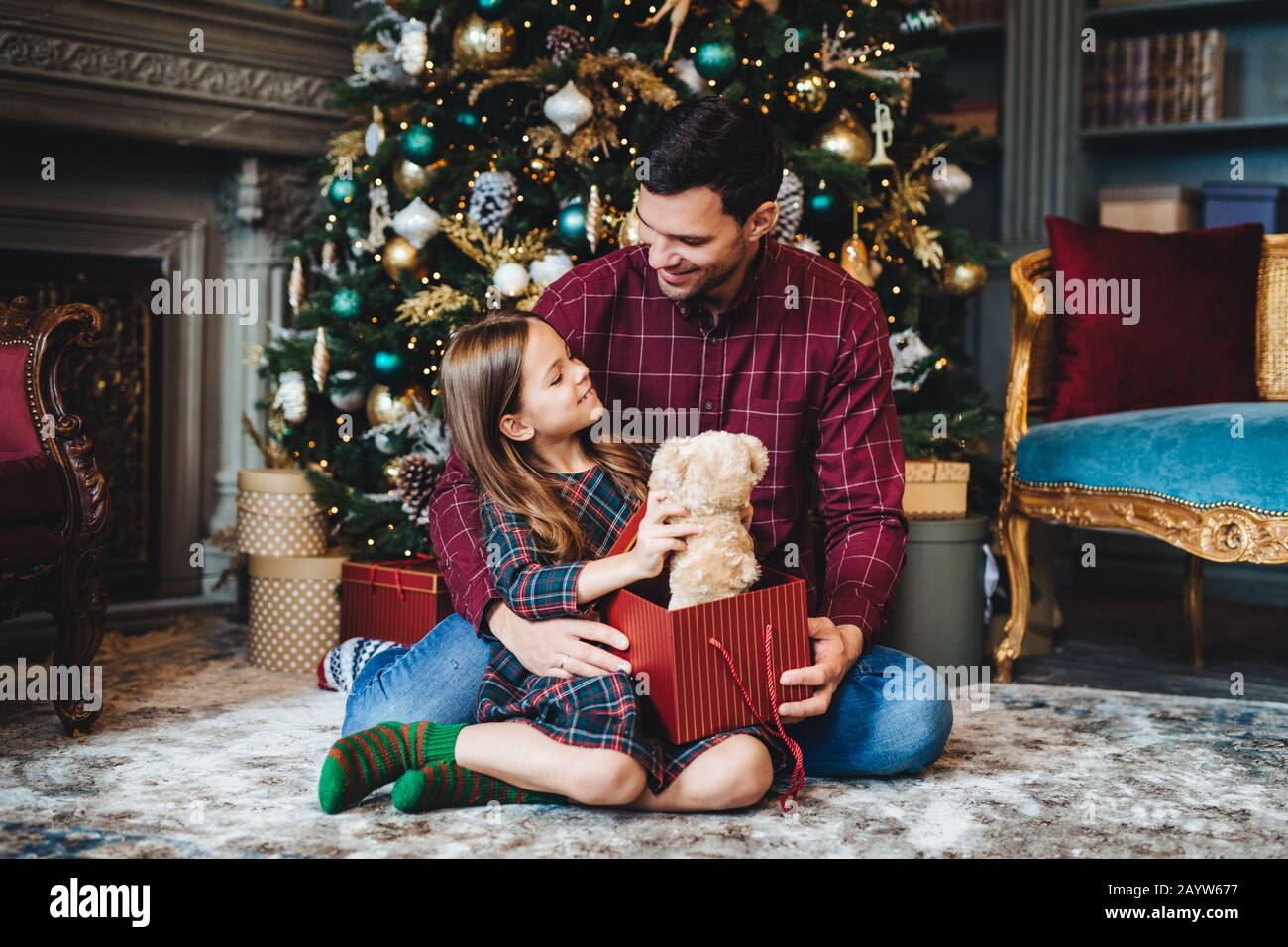 Child with teddy bear hi-res stock photography and images - Alamy