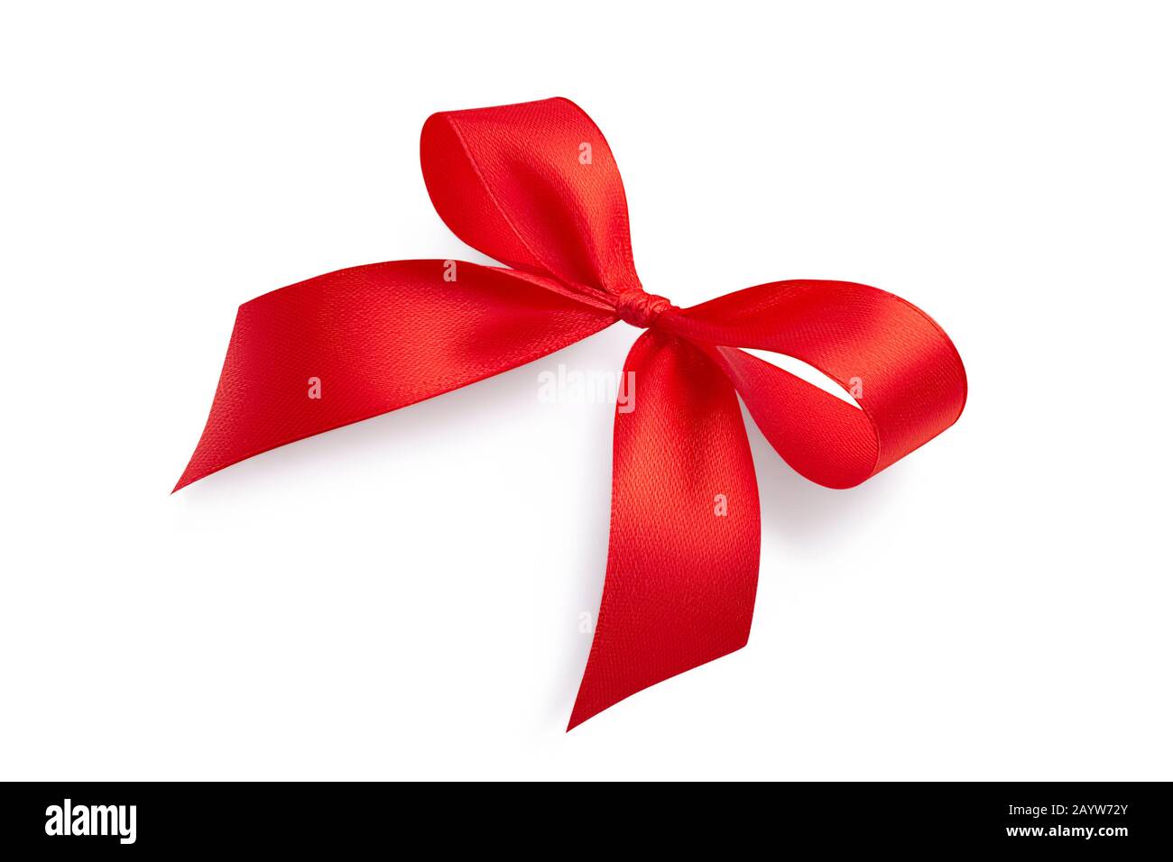 Side view of a beautiful red bright shiny holiday gift bow tied from a ...