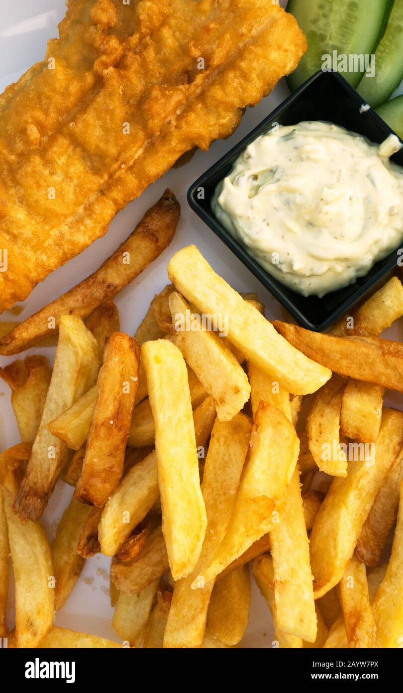 Street food. Breaded cod fillet with french fries Stock Photo - Alamy