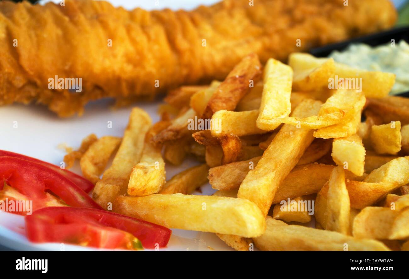Street food. Breaded cod fillet with french fries Stock Photo - Alamy