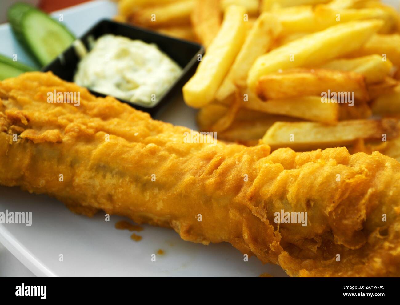 Street food. Breaded cod fillet with french fries Stock Photo - Alamy