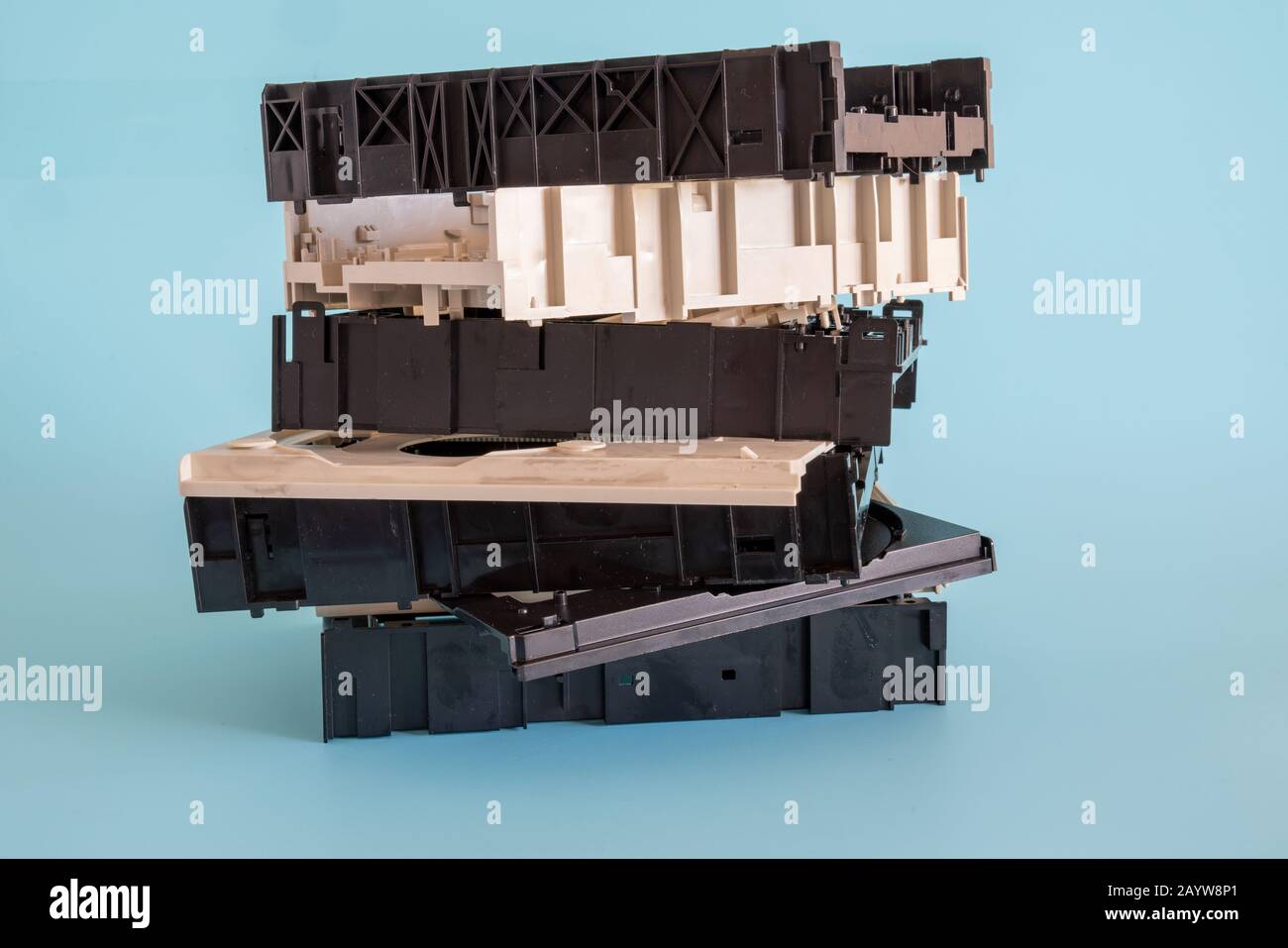 Old disassembled computer DVD drive for recycle on blue background ...