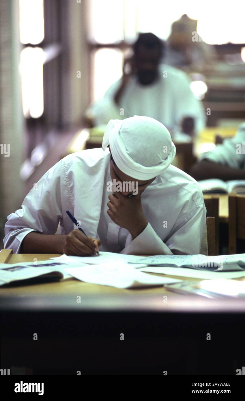 Emirati boy writing hi-res stock photography and images - Alamy