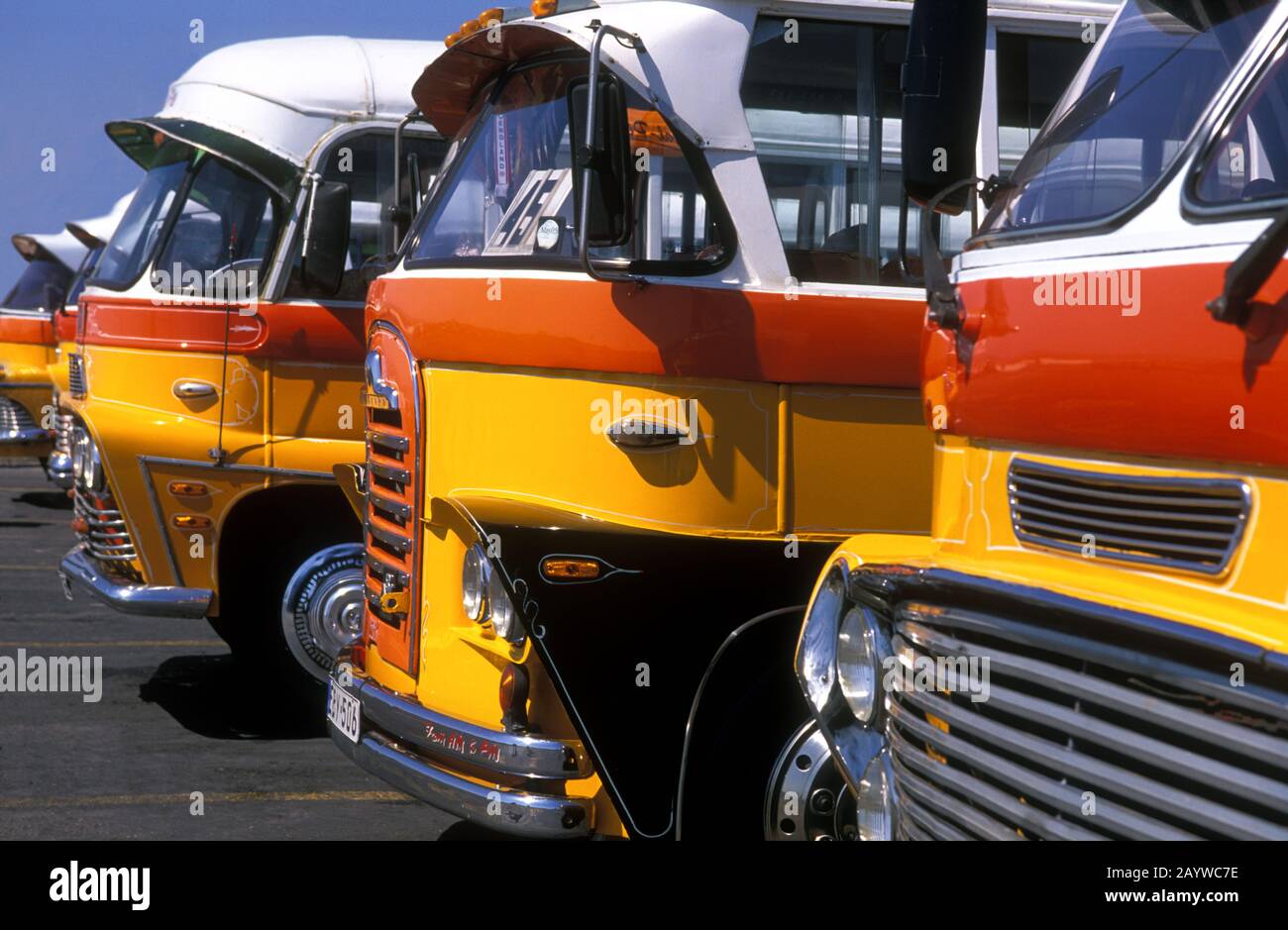 Malta traditional brightly painted buses Stock Photo - Alamy