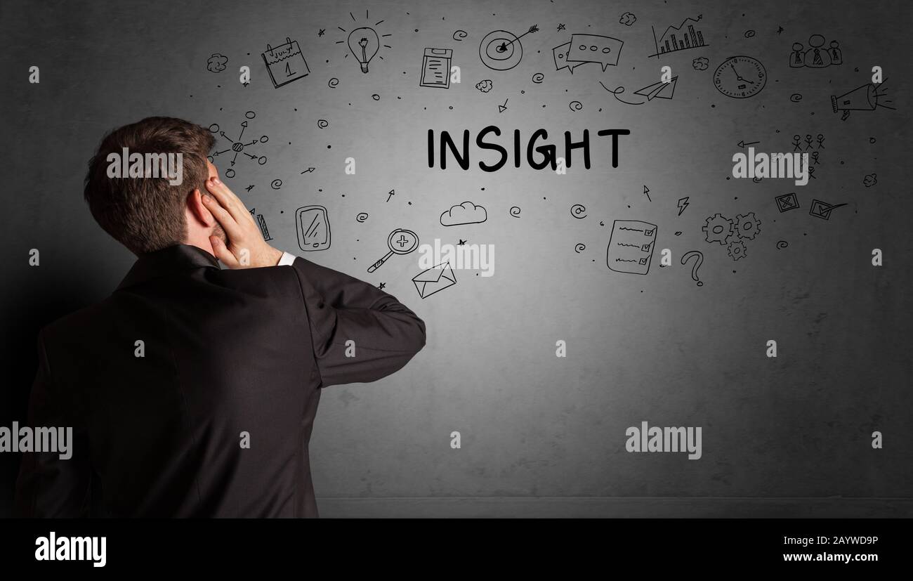 businessman drawing a creative idea sketch with INSIGHT inscription ...