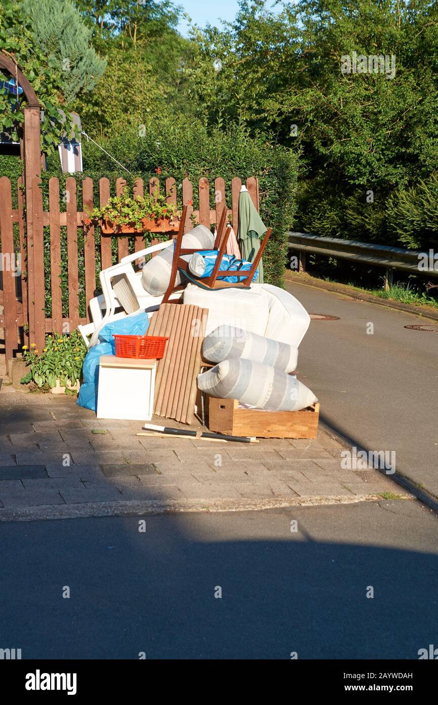 a lot of garbage in the street Stock Photo - Alamy