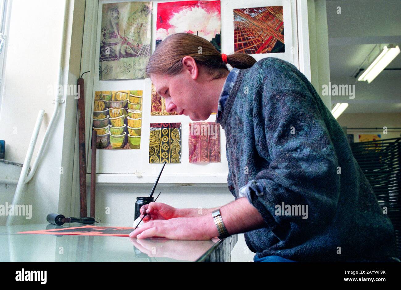 Art student doing an ink painting Stock Photo - Alamy