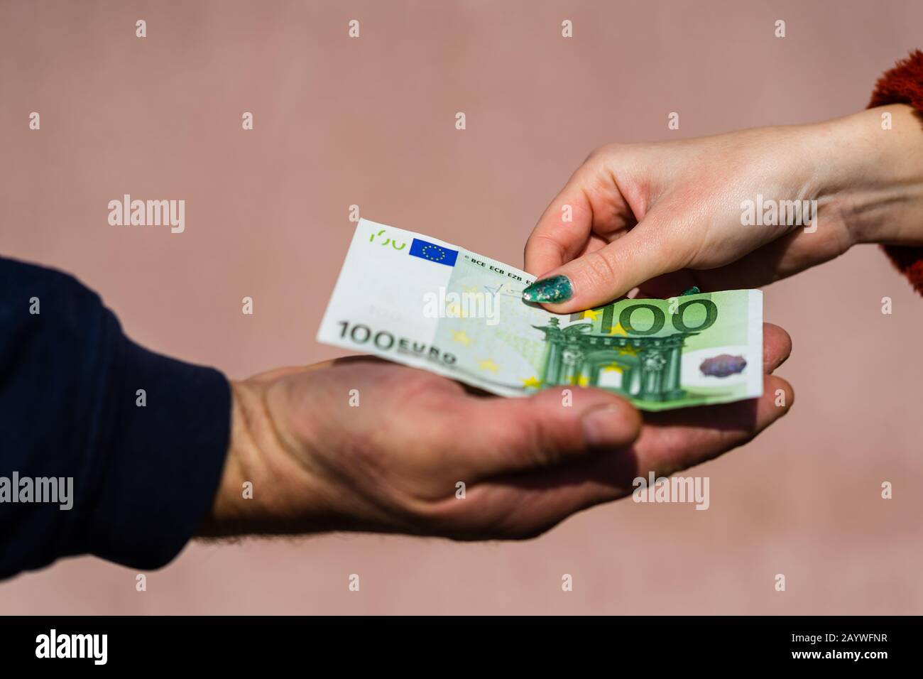 Hand giving money like bribe or tips or salary isolated, hard worked ...
