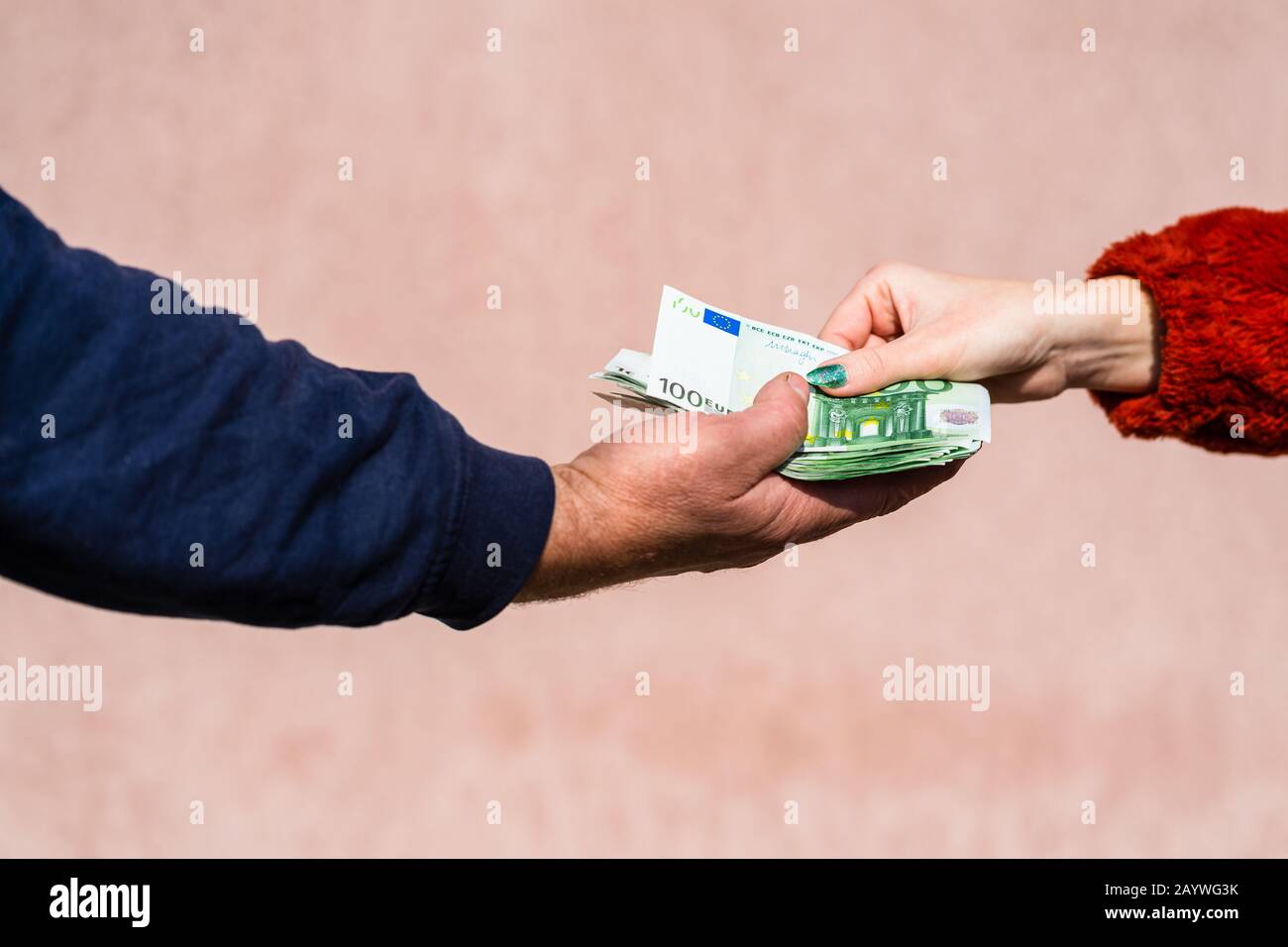 Hand giving money like bribe or tips or salary isolated, hard worked ...