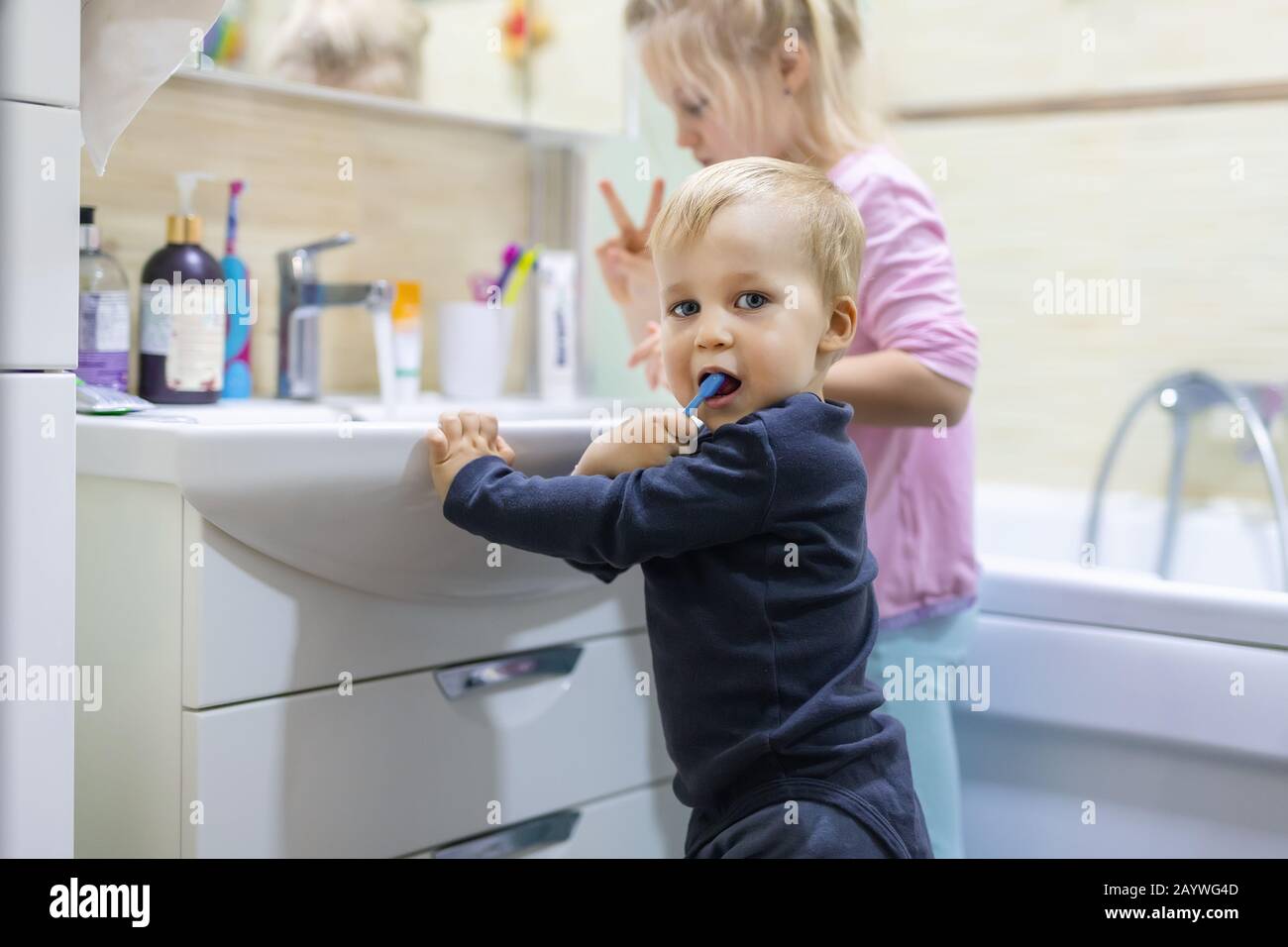 Child wash hand brush teeth hi-res stock photography and images - Alamy