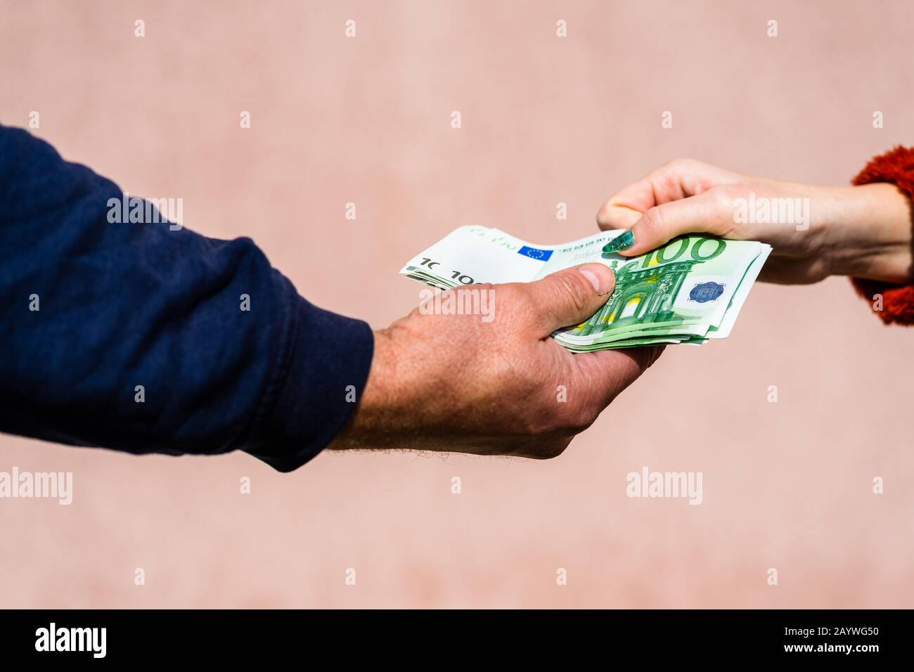 Hand giving money like bribe or tips or salary isolated, hard worked ...