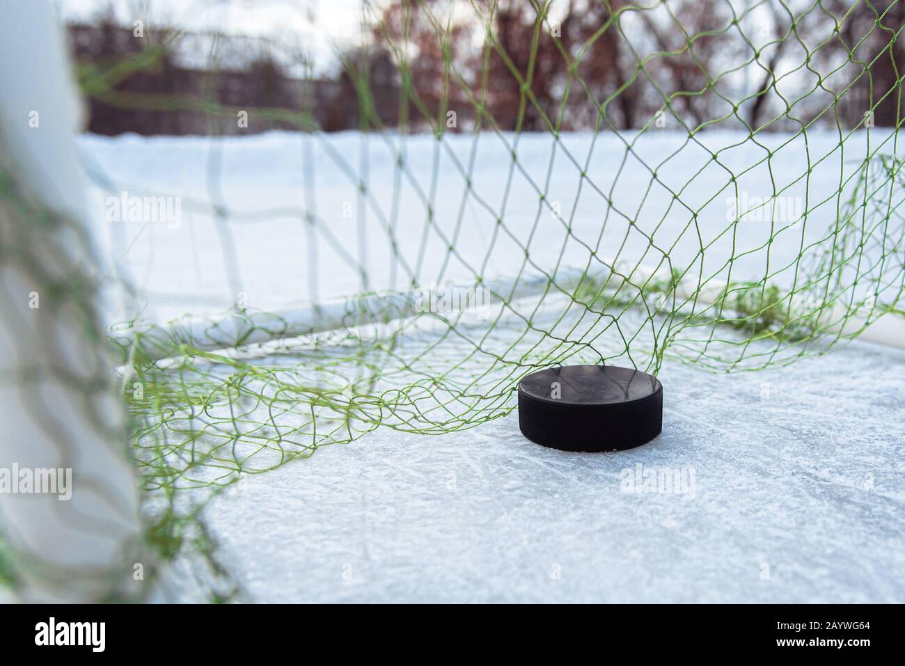 Puck in the net hi-res stock photography and images - Alamy