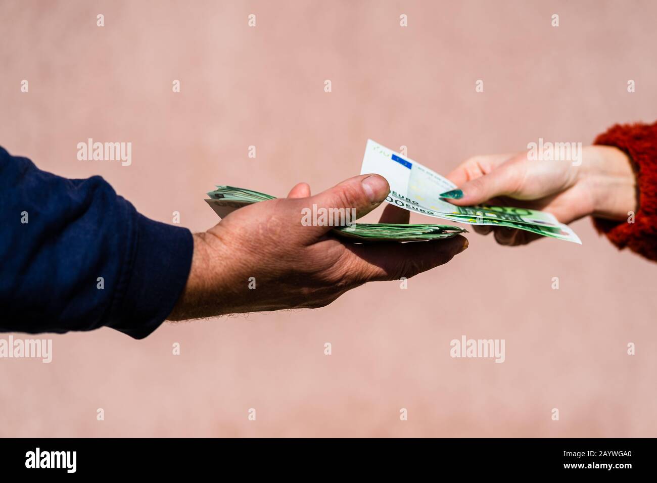 Hand giving money like bribe or tips or salary isolated, hard worked ...