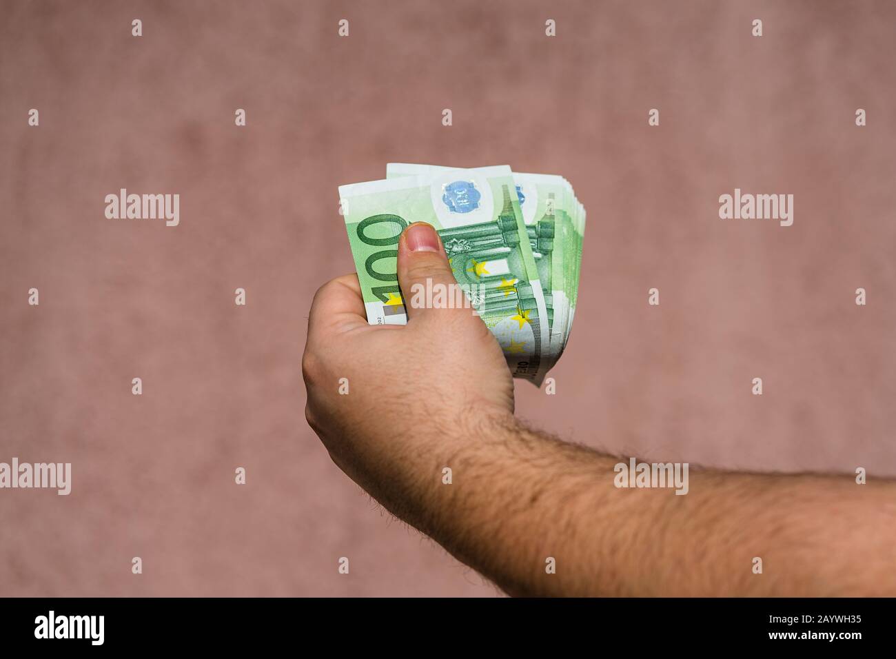 Hand holding and showing euro money or giving money. World money ...