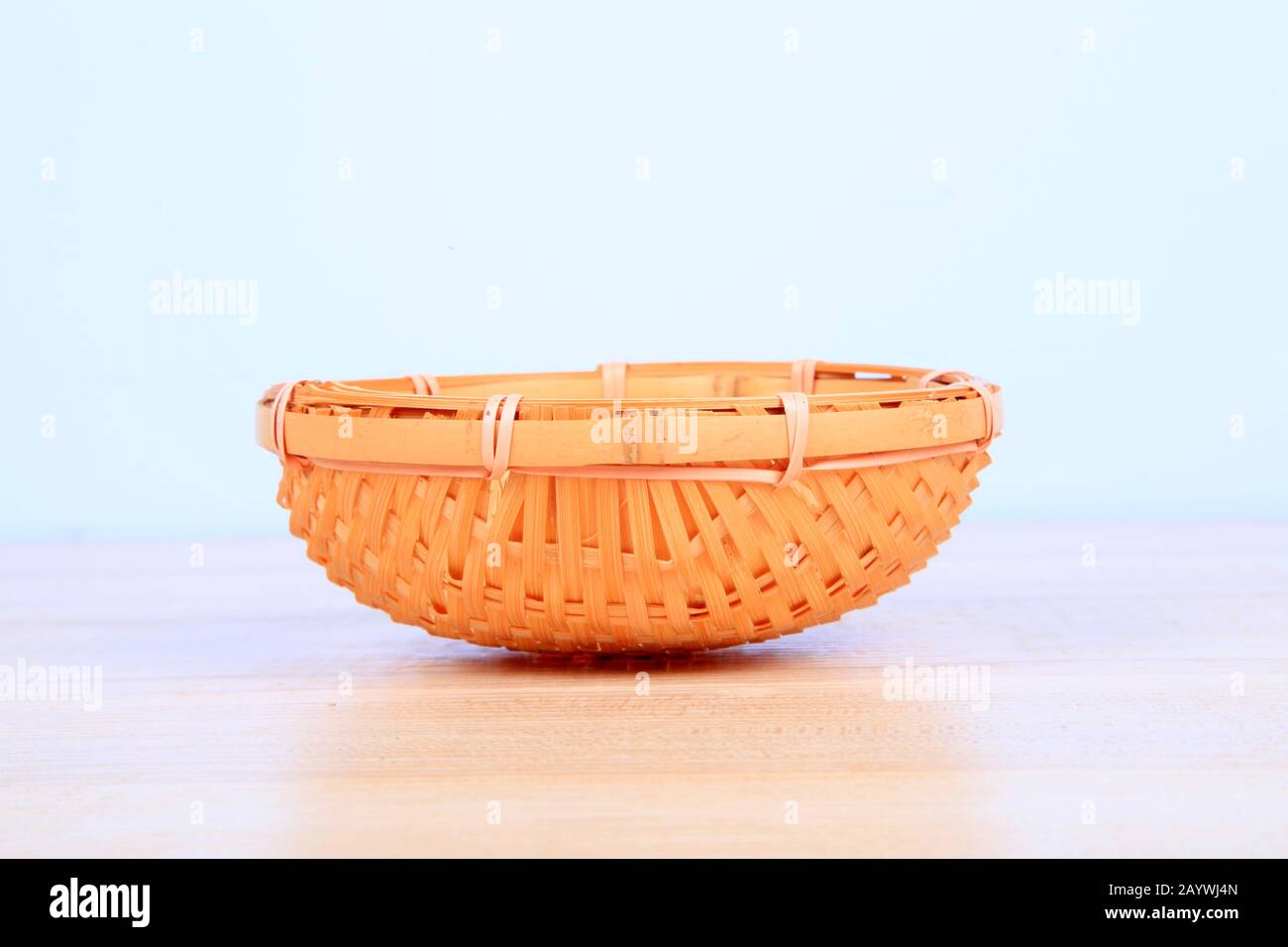 Woven items on white background Stock Photo - Alamy