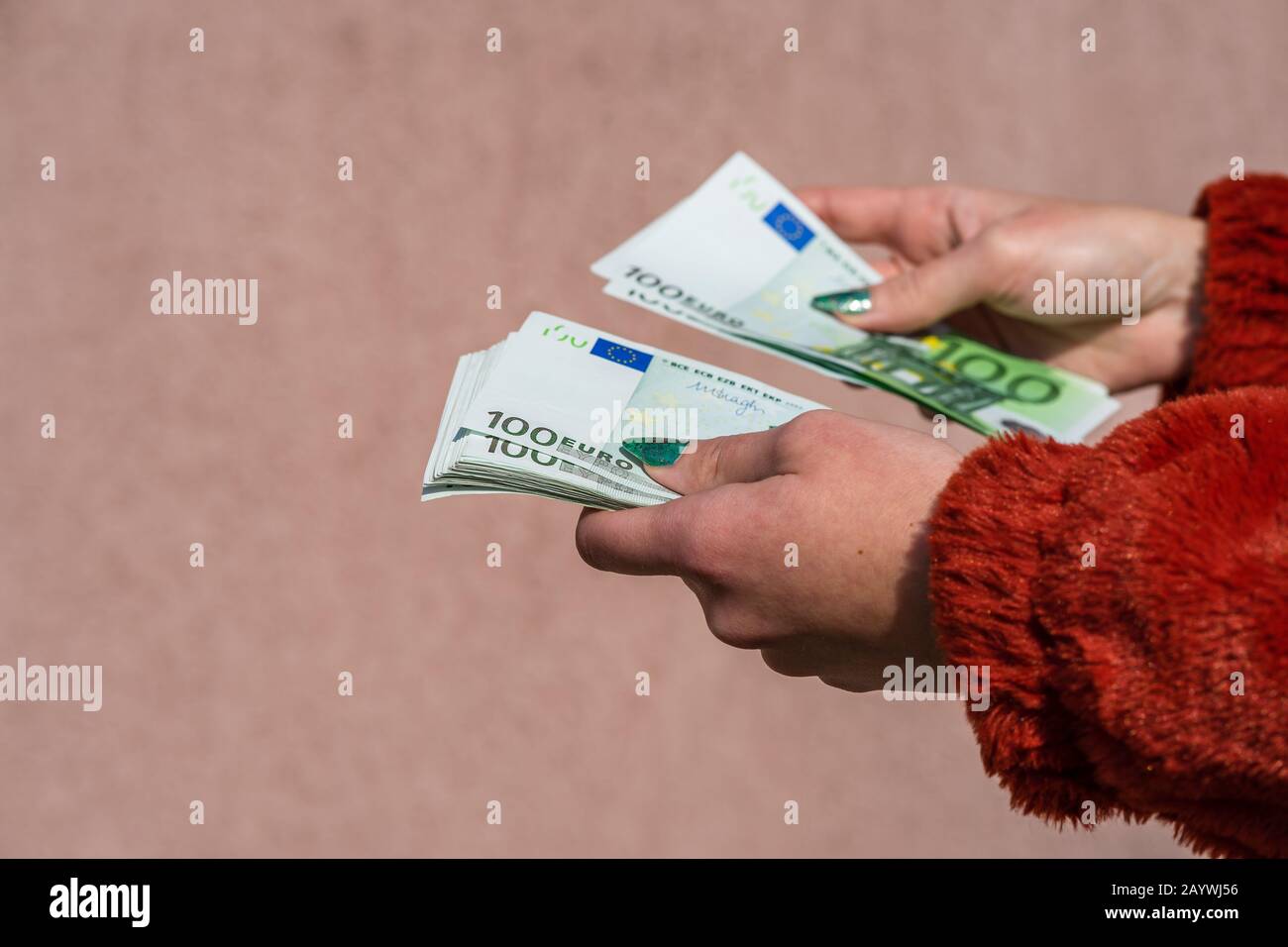 Hand holding and showing euro money or giving money. World money ...