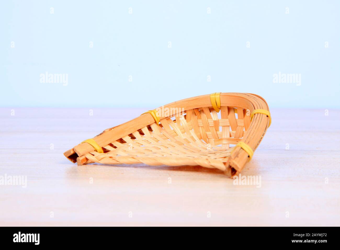 Woven items on white background Stock Photo - Alamy