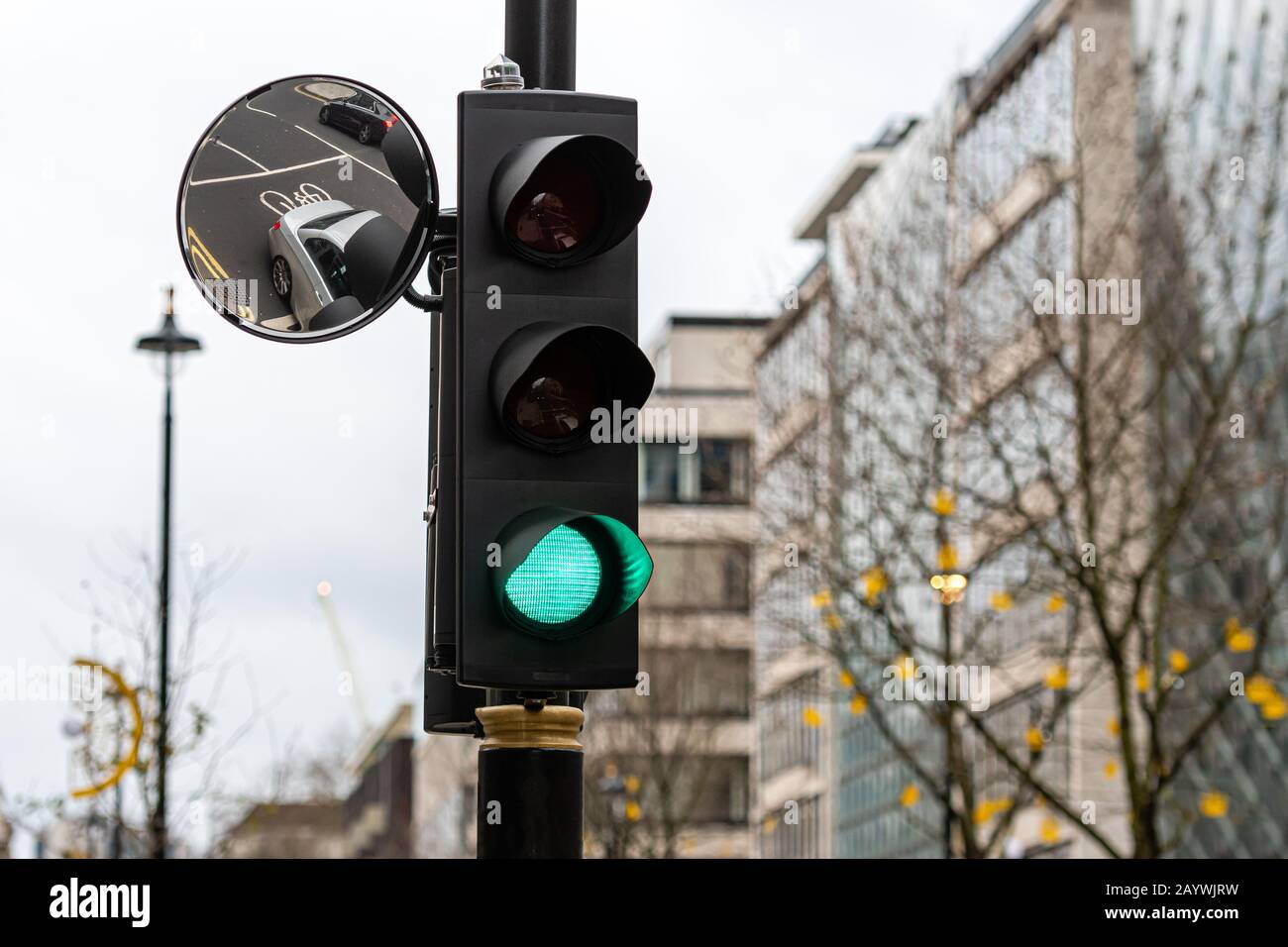 Green Traffic Light Signal and Traffic Convex Mirror with the ...
