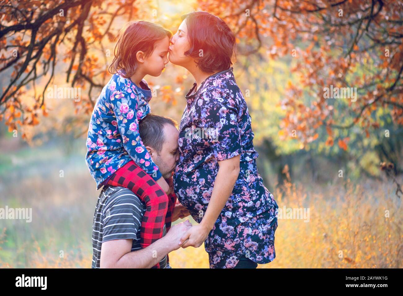 familiy waiting for the second child Stock Photo - Alamy