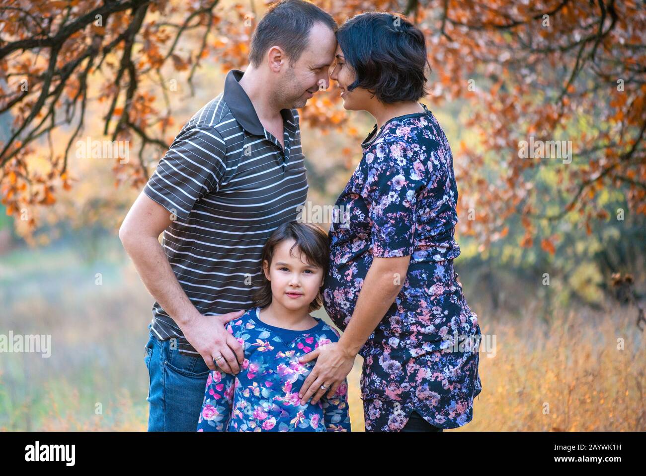 familiy waiting for the second child Stock Photo - Alamy