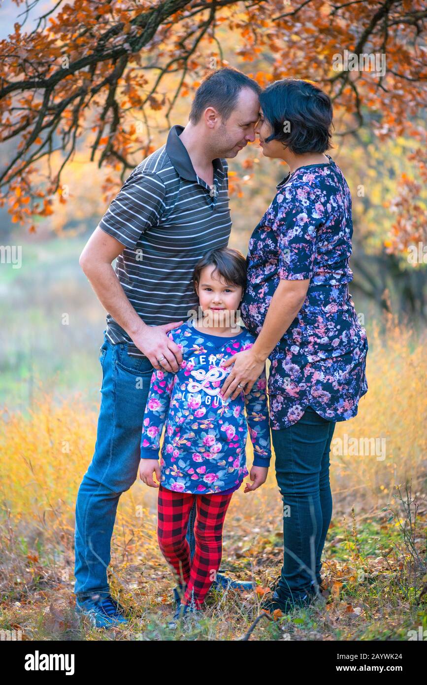 familiy waiting for the second child Stock Photo - Alamy