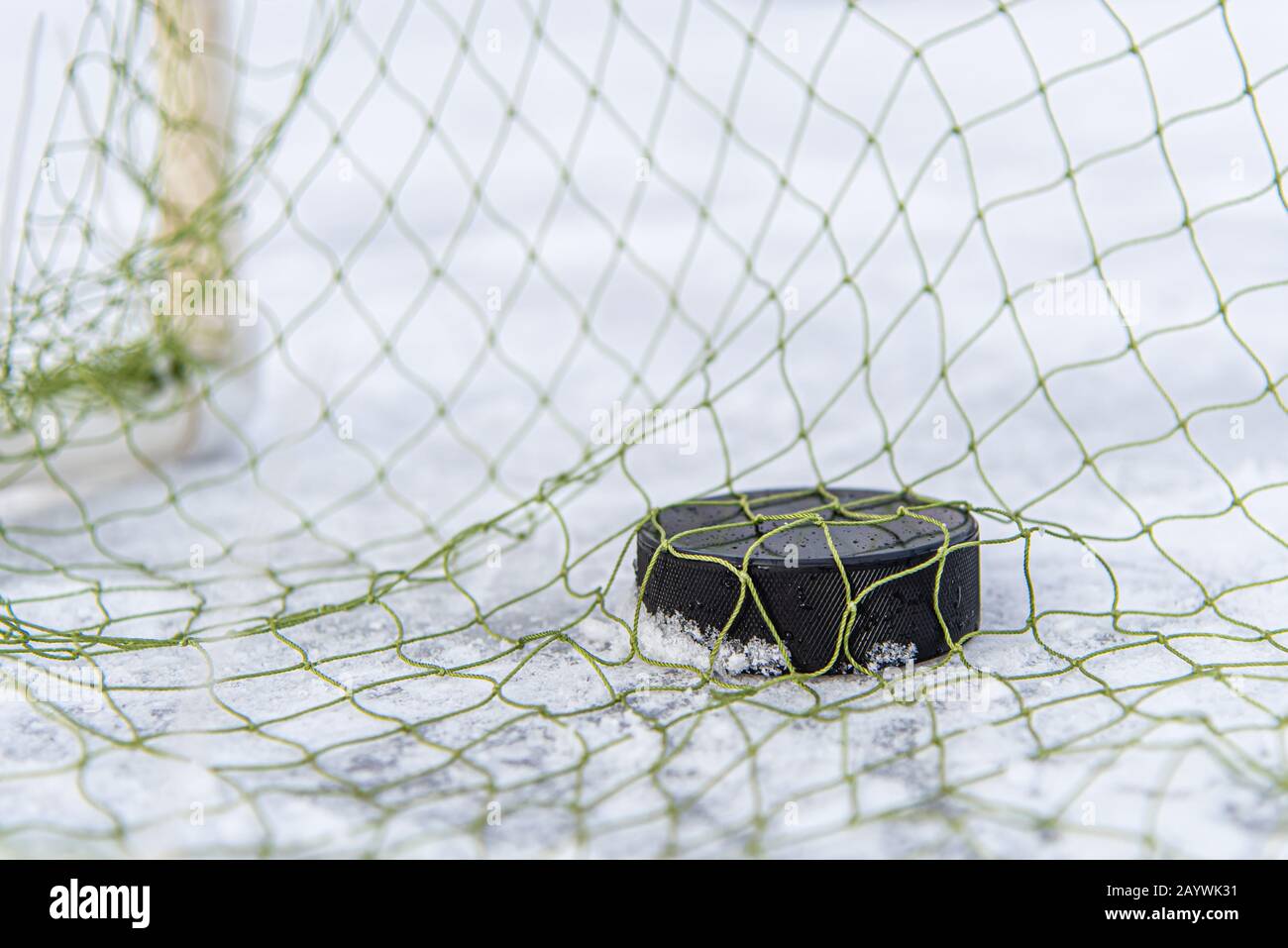 Puck in goal hi-res stock photography and images - Alamy