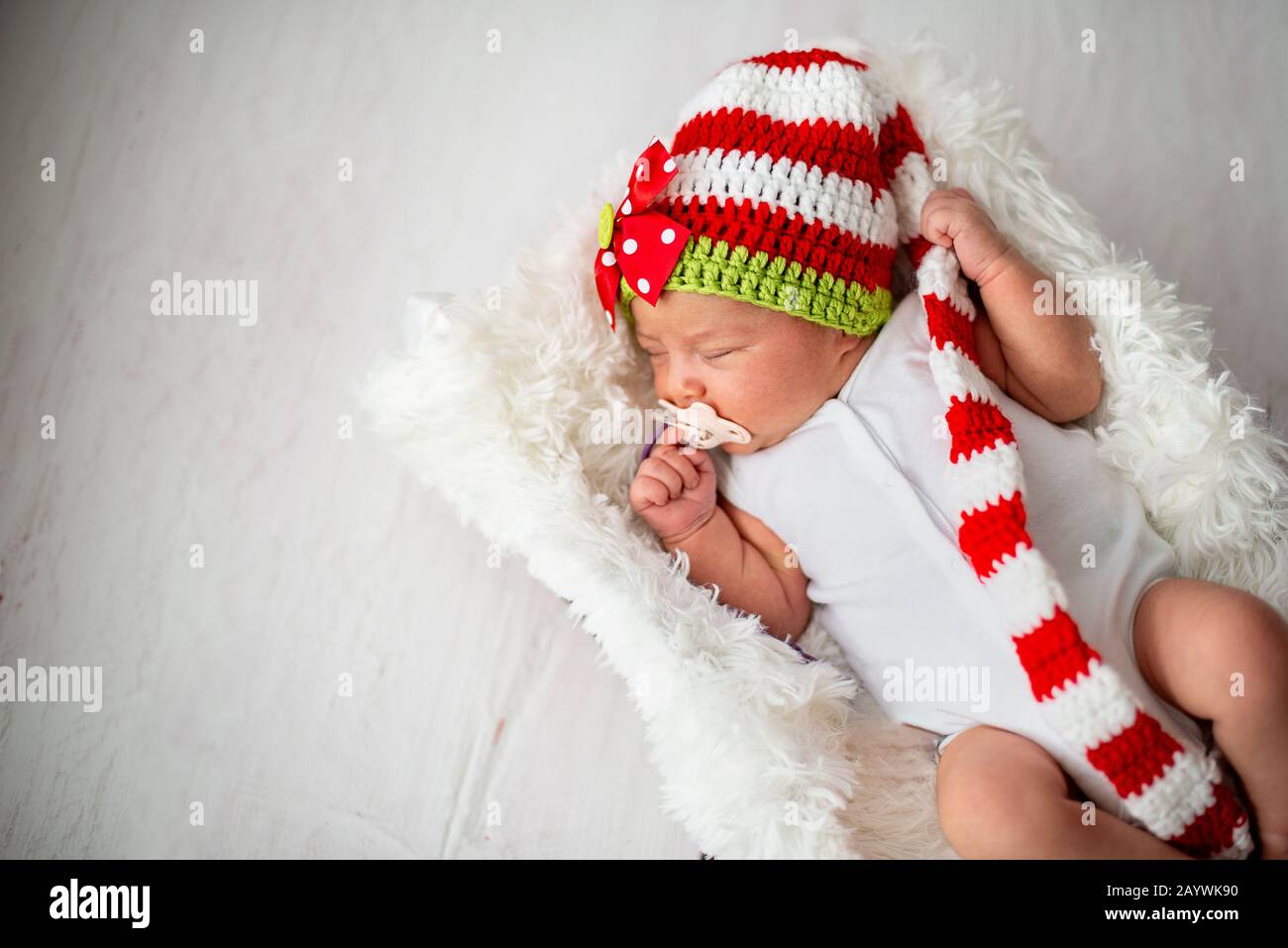 newborn baby in studio with pacifier Stock Photo - Alamy
