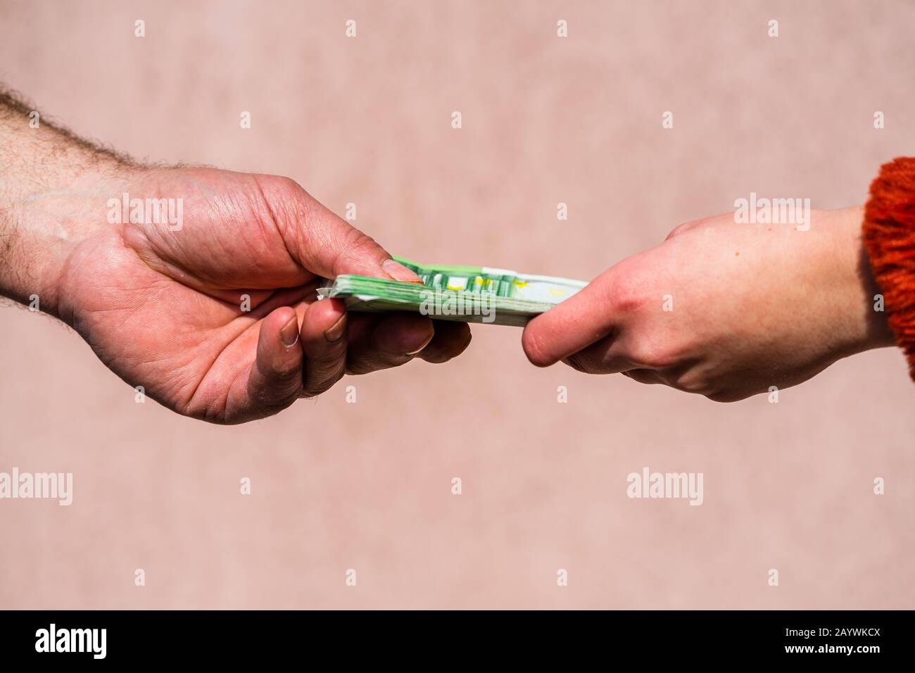 Hand giving money like bribe or tips or salary isolated, hard worked ...