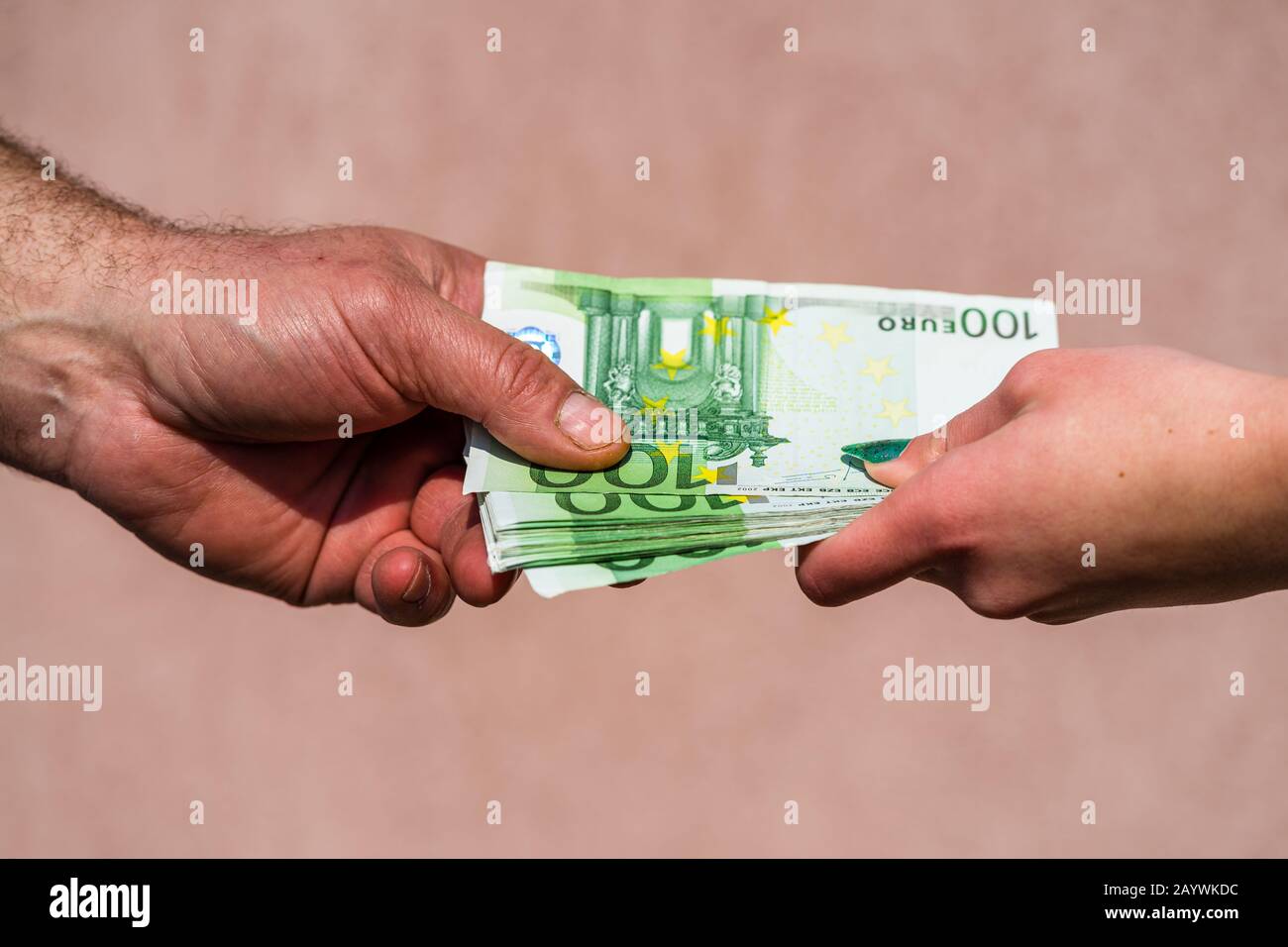 Hand giving money like bribe or tips or salary isolated, hard worked ...