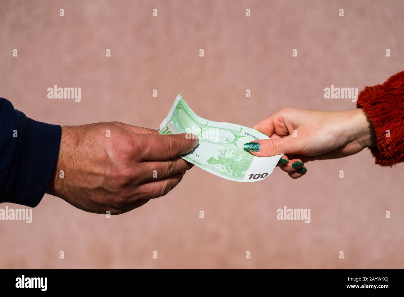 Hand giving money like bribe or tips or salary isolated, hard worked ...