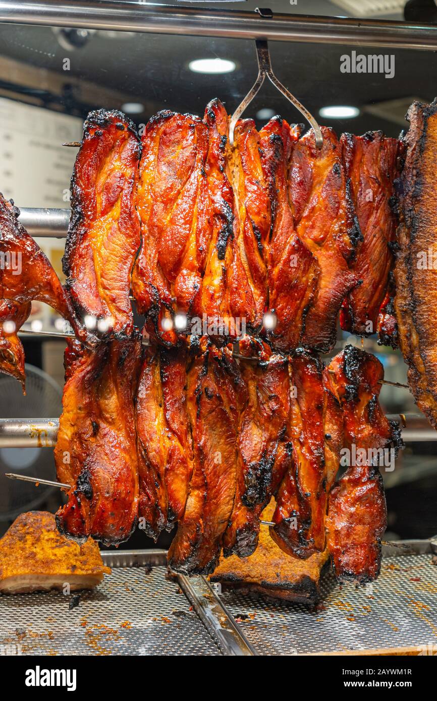 Char siu and crispy pork meat at Singapore restaurant Stock Photo - Alamy