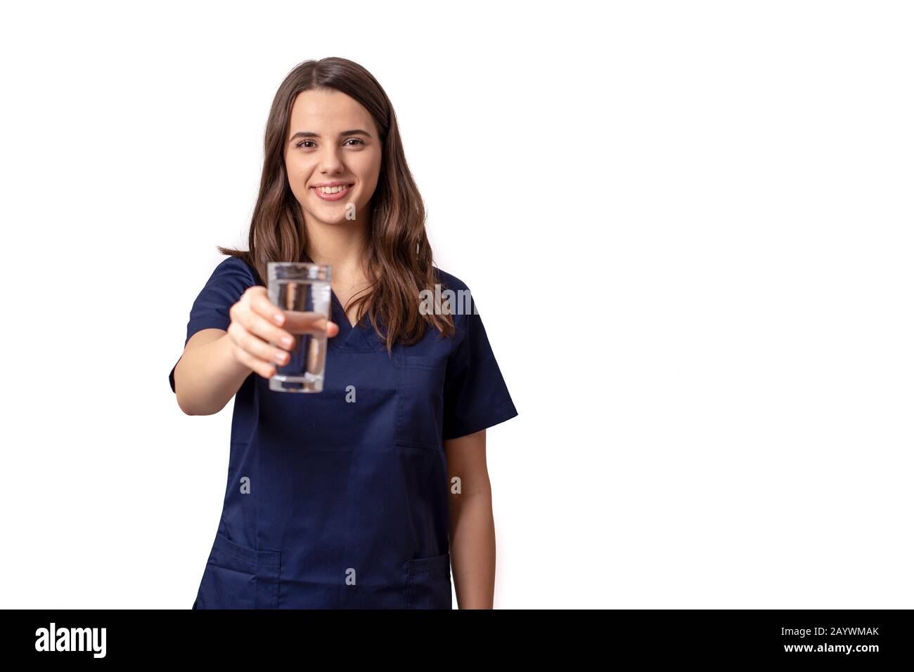 Female doctor's hand holding glass of water. Health care concept Stock ...