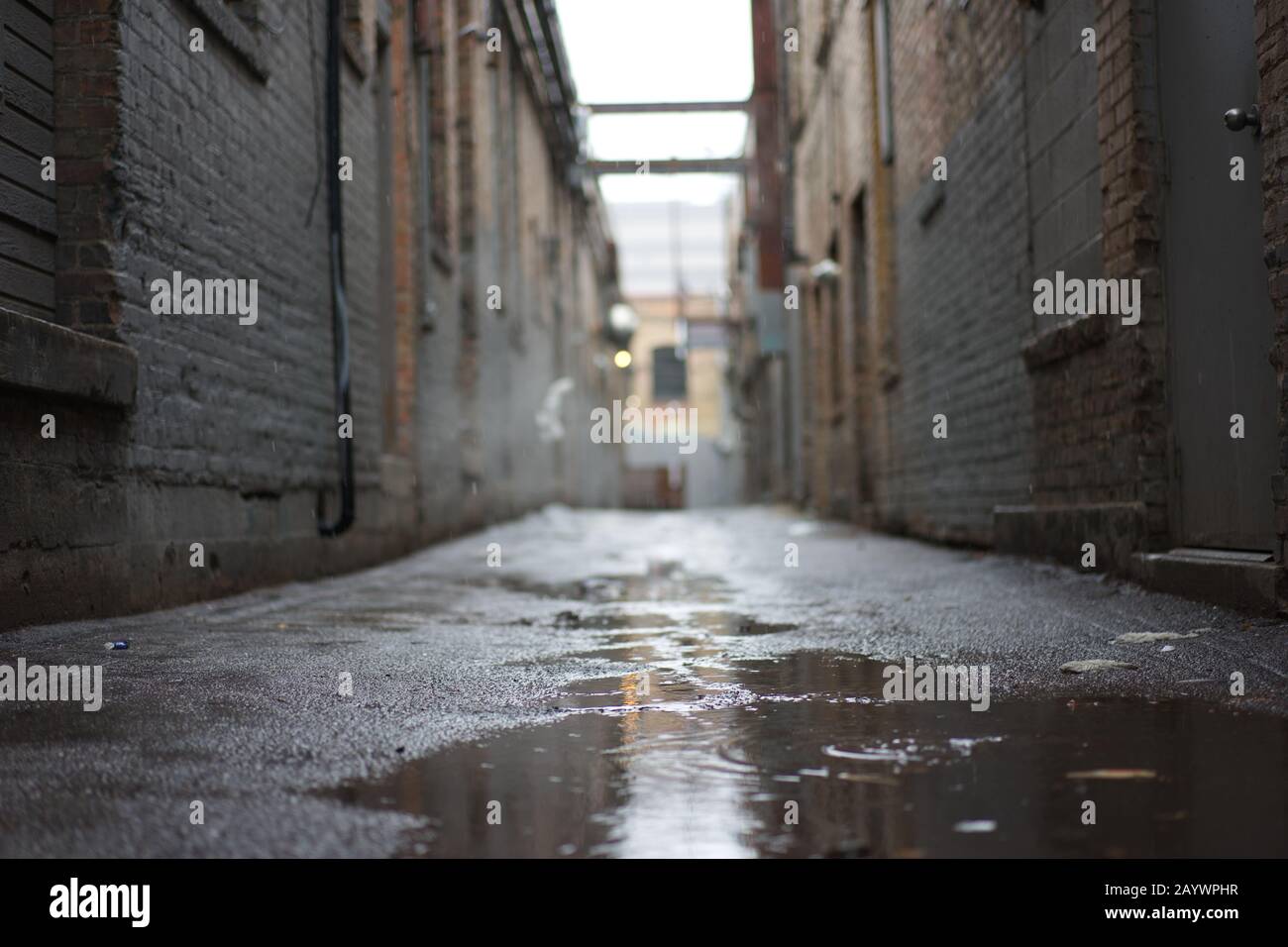 Street alley in the city on a rainy day Stock Photo - Alamy