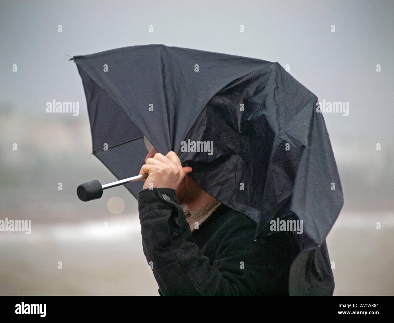 A wet and windy day on the beach at Brighton Stock Photo - Alamy