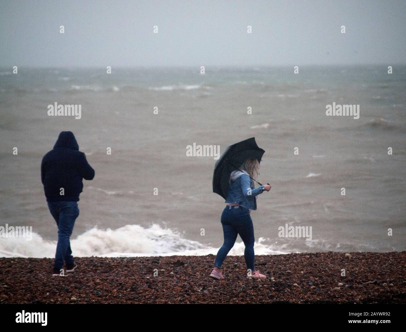 A wet and windy day on the beach at Brighton Stock Photo - Alamy