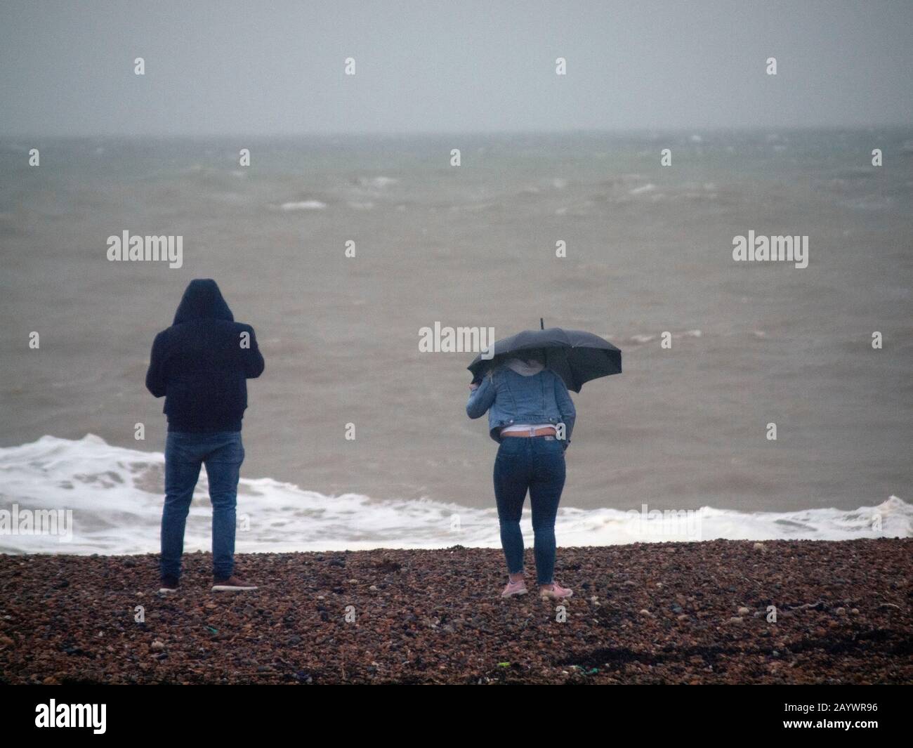 A wet and windy day on the beach at Brighton Stock Photo - Alamy