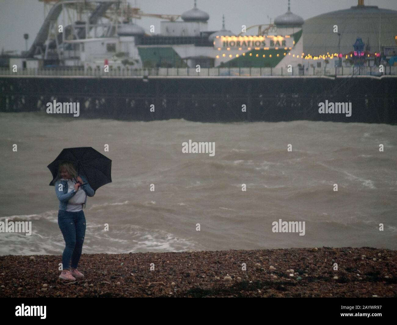 A wet and windy day on the beach at Brighton Stock Photo - Alamy
