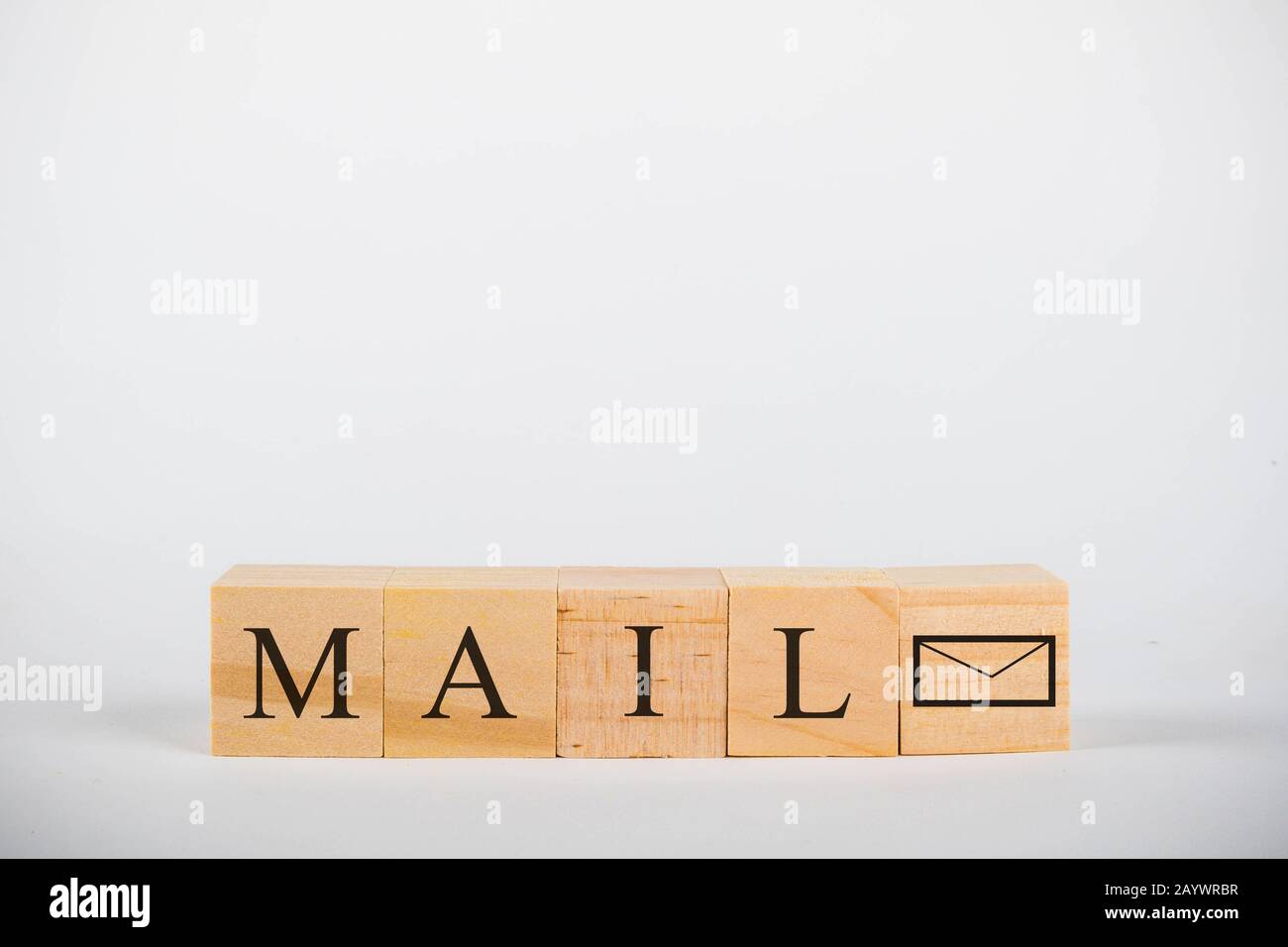 Wooden cubes with lettering spelling Mail with an envelope symbol Stock ...