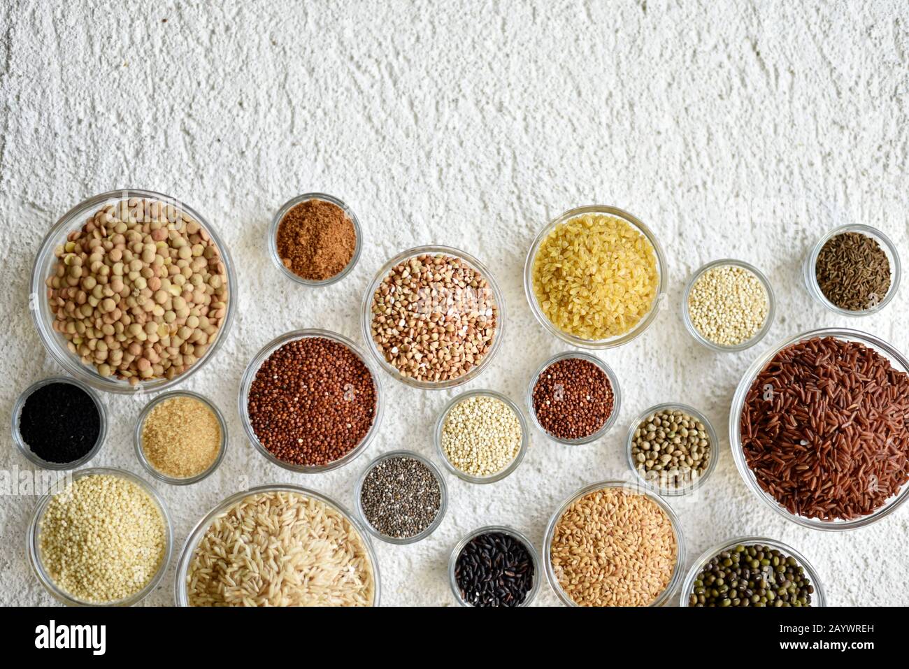 glass bowls with spices and grains Stock Photo - Alamy