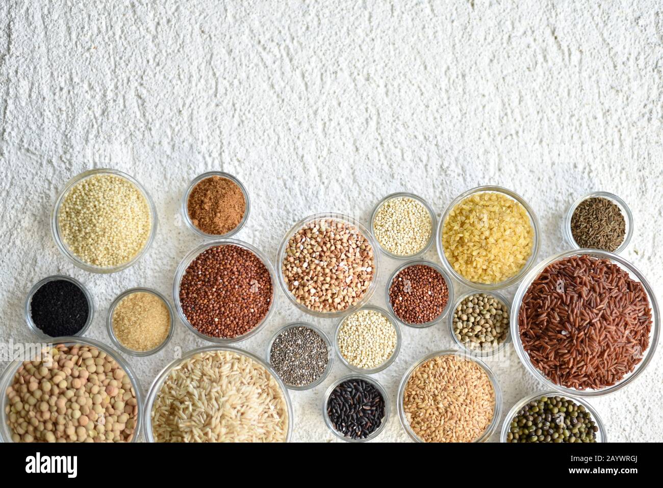 glass bowls with spices and grains Stock Photo - Alamy