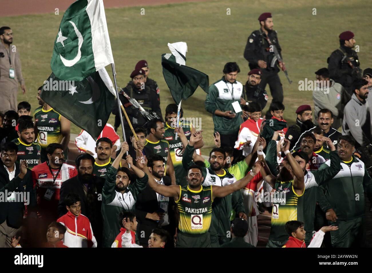 Pakistani Kabaddi team's players wave Pakistan national flags and ...