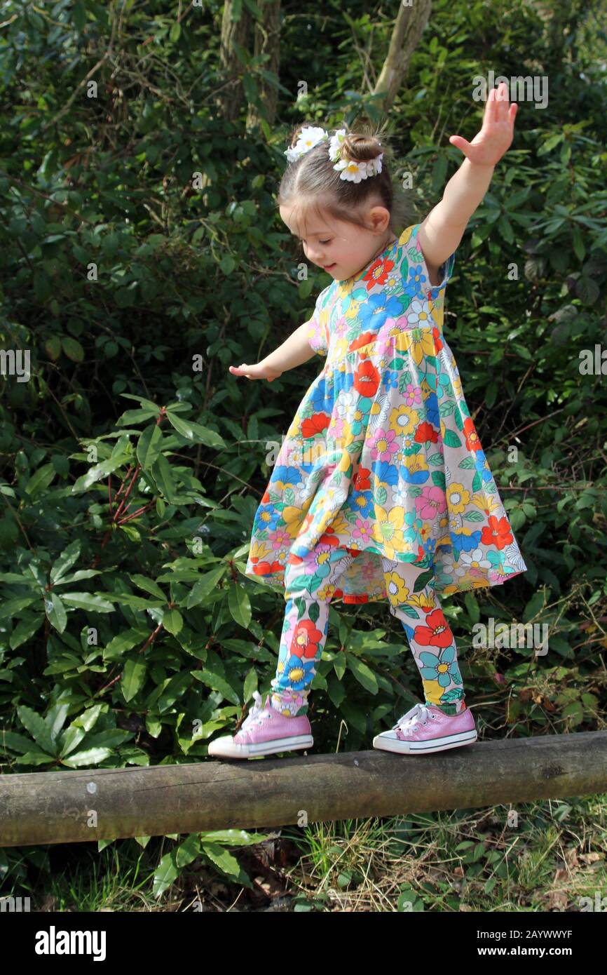 girl balancing in forest at monkey world Stock Photo - Alamy