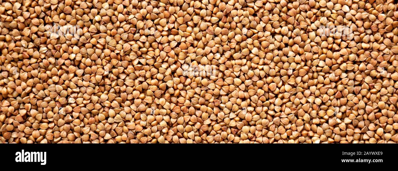 Uncooked Dry Roasted Buckwheat texture Stock Photo - Alamy