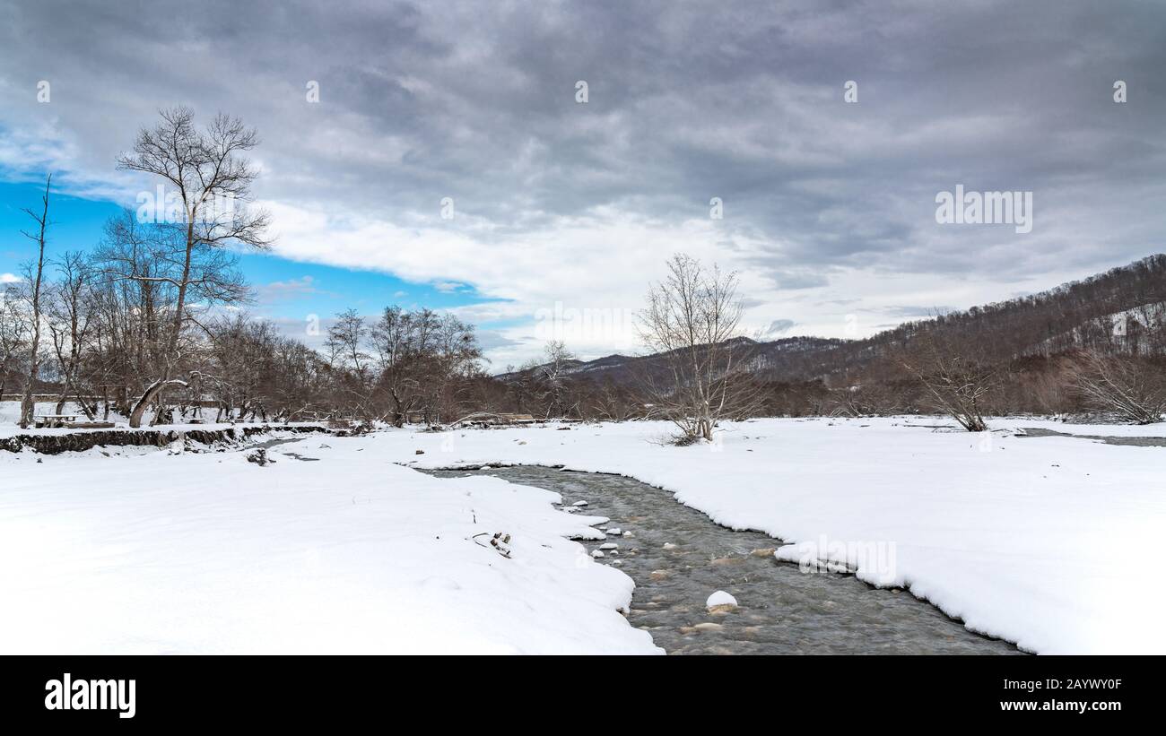 Stream flow in winter hi-res stock photography and images - Alamy