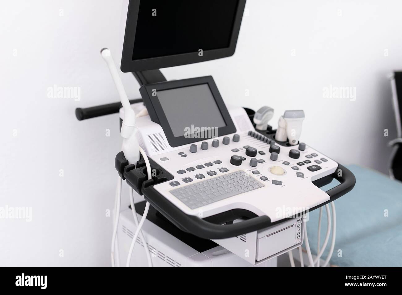 ultrasound machine doctor's hand usg investigation Stock Photo - Alamy