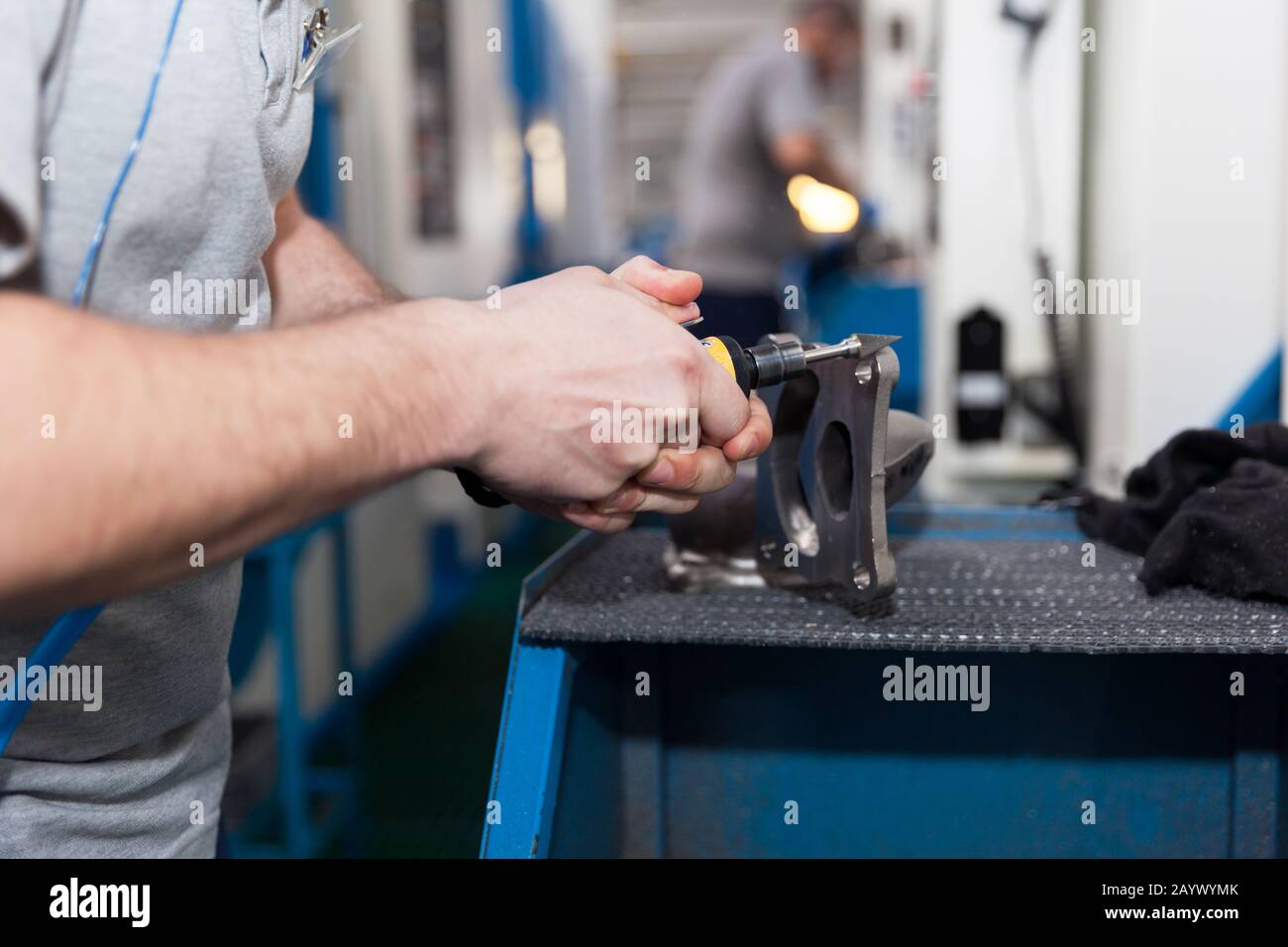 Manual work in the automotive industry Stock Photo - Alamy