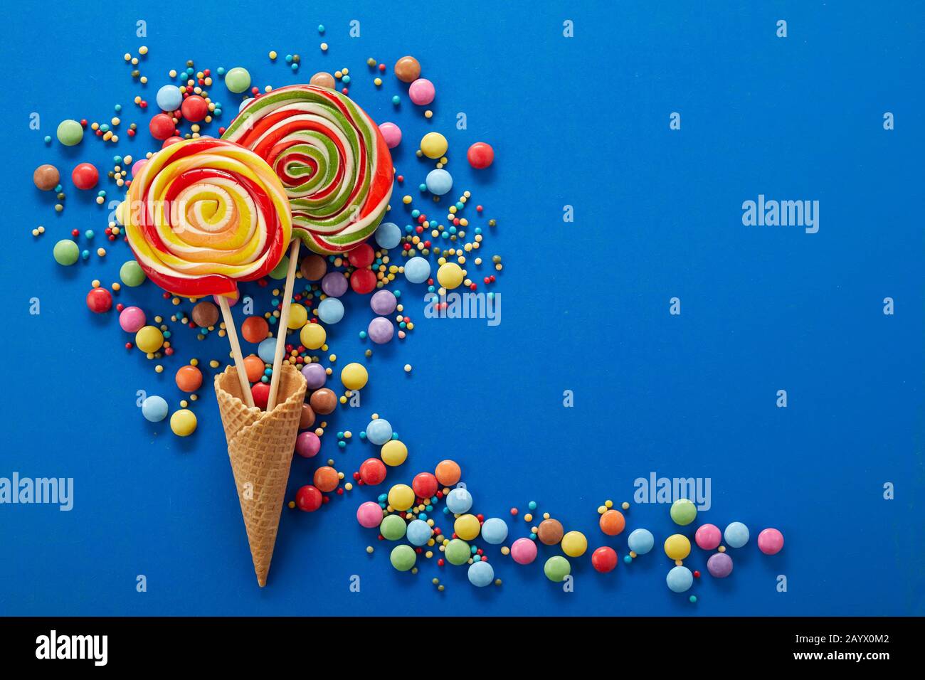 Artistic party background with colorful confectionery with sugar-coated ...