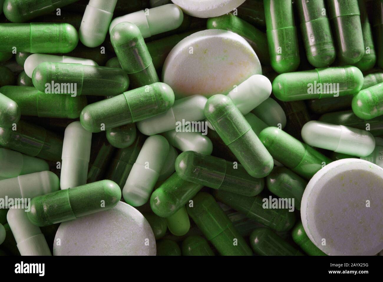 green and natural swallowing capsules Stock Photo - Alamy green and natural swallowing capsules Stock Photo - Alamy